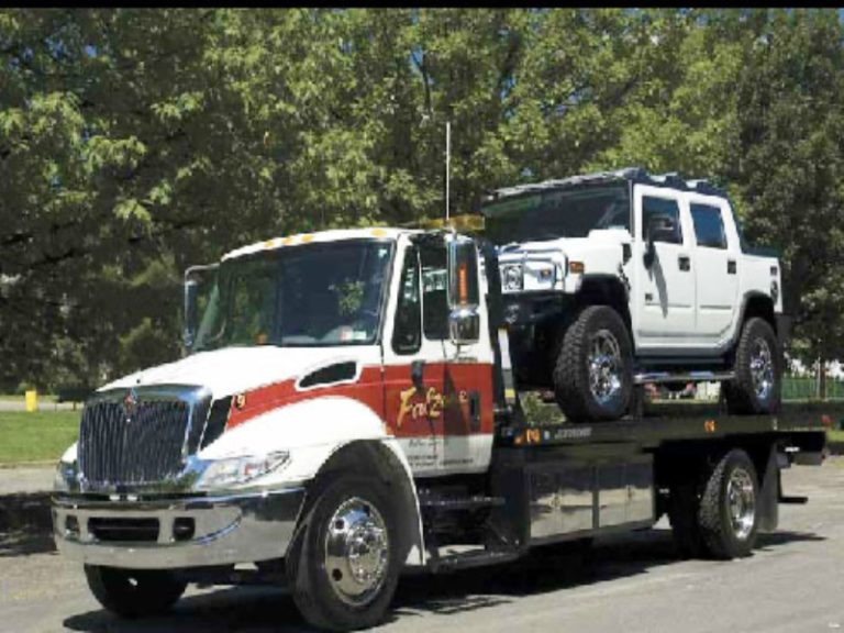 Wrecker vs. Flatbed Towing Explained - Falzone Towing